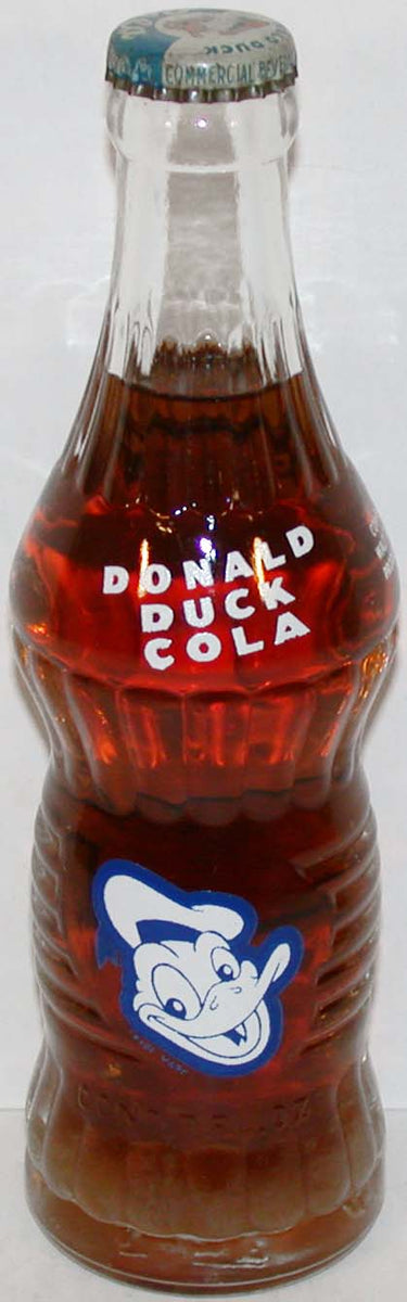 Vintage soda pop bottle DONALD DUCK COLA 7oz Walt Disney 1953 full wit ...