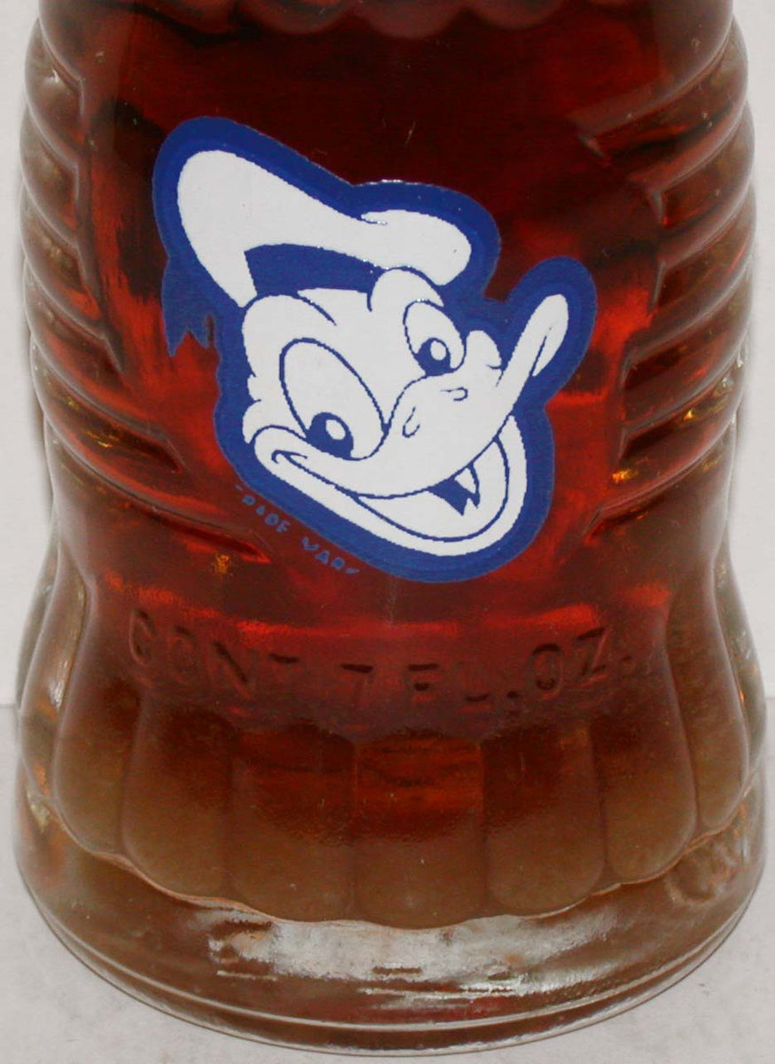 Vintage soda pop bottle DONALD DUCK COLA 7oz Walt Disney 1953 full wit ...